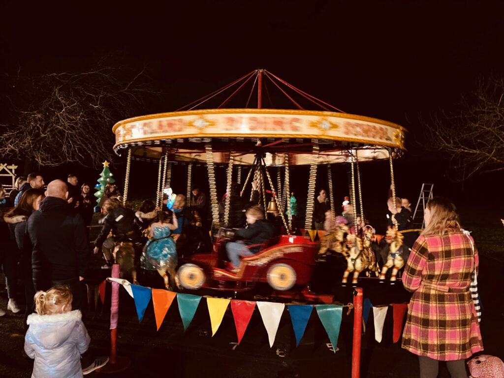 Christmas Carousel Fun At Beoley School - Oakland International